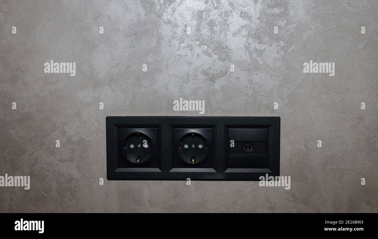 Wall electrical socket, interior socket, TV antenna adapter Stock Photo ...