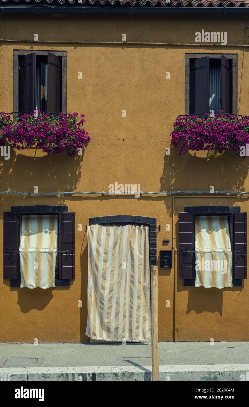House painted in italian colors hi-res stock photography and images - Alamy