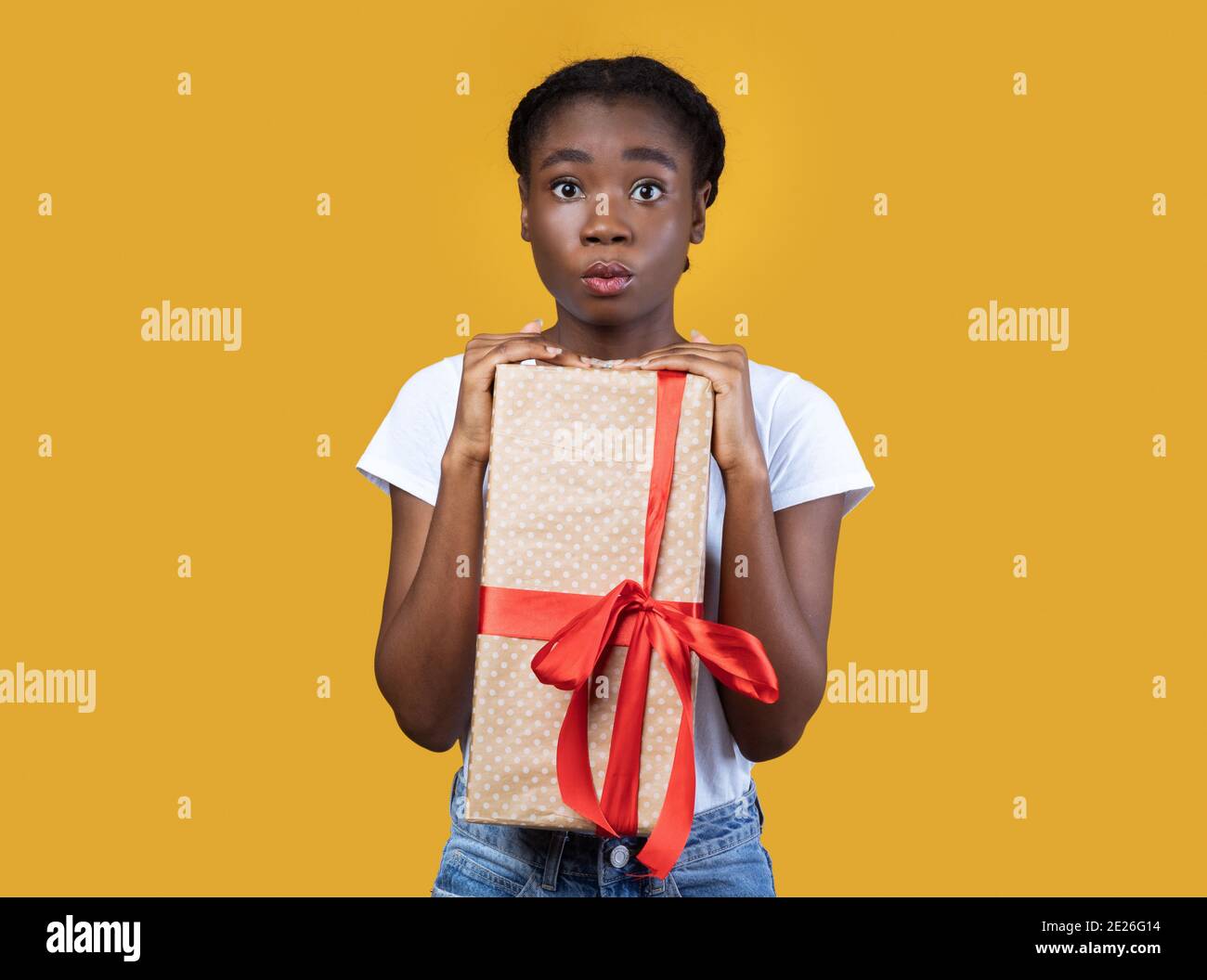 Woman posing gift box hi-res stock photography and images - Alamy