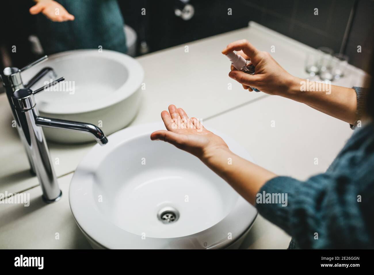 The girl treats her hands with an antiseptic. Personal hygiene and ...