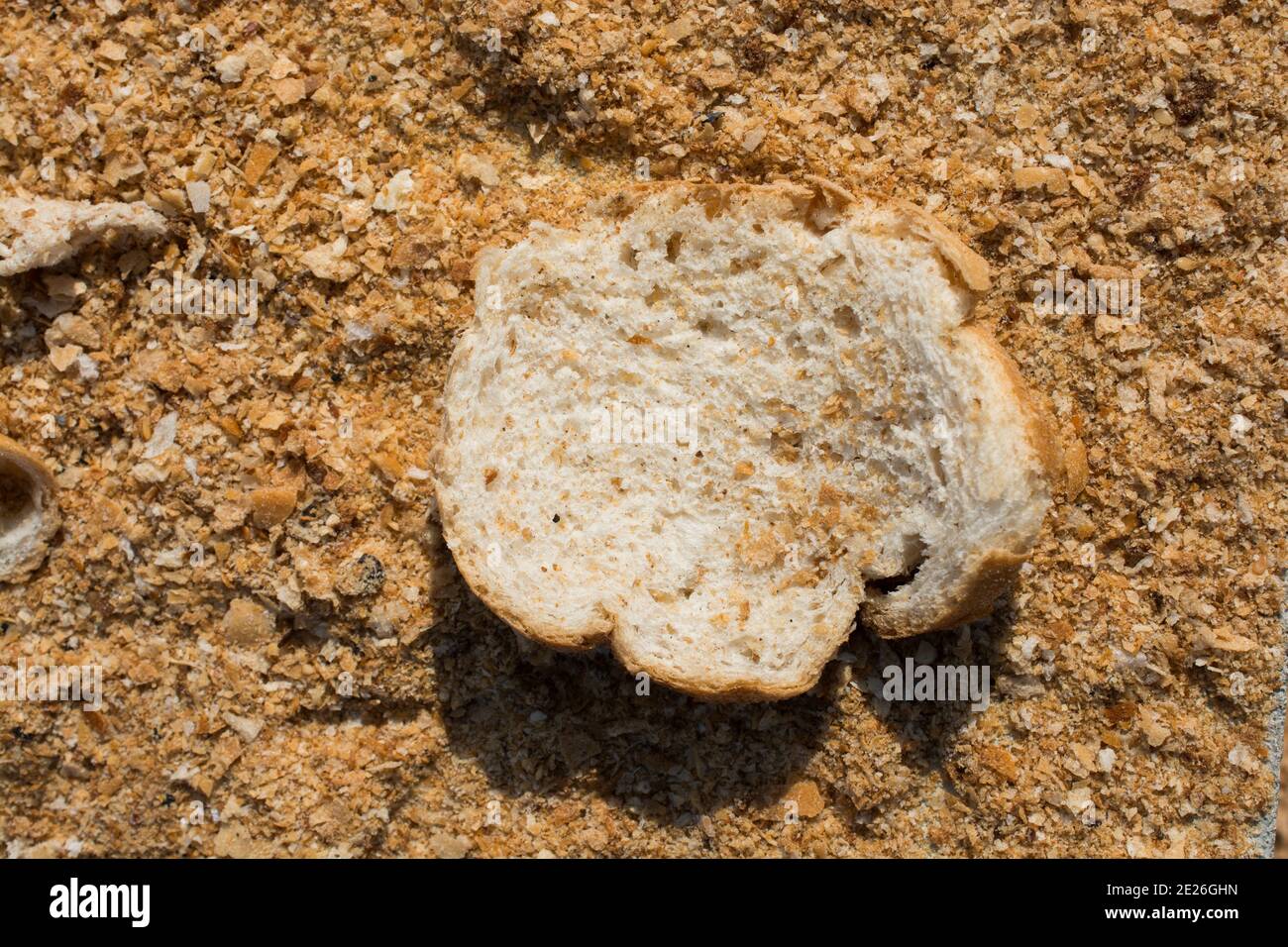Pieces of spoiled bread waste in rubbish Stock Photo - Alamy