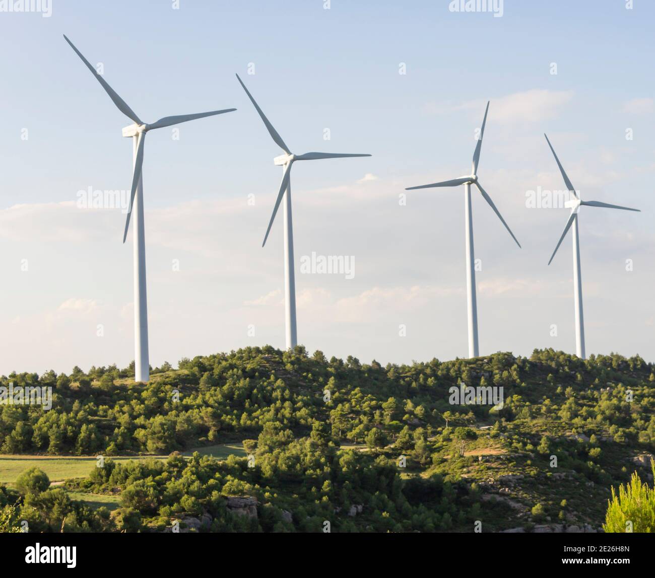 Windmill farm on hills landscape .Green eco energy concept Stock Photo ...