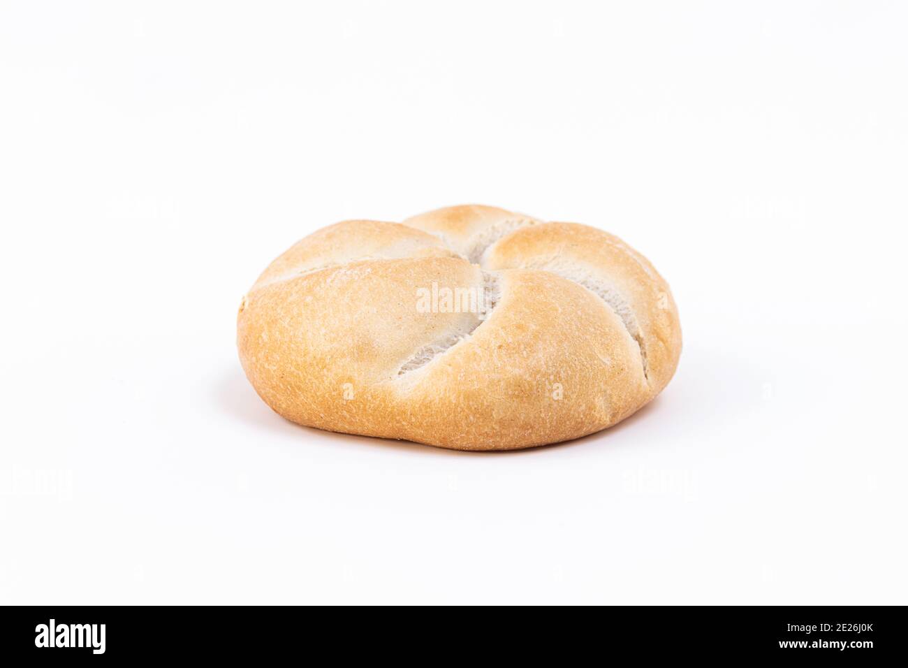 Closeup of a freshly baked white bread bun isolated on a white ...