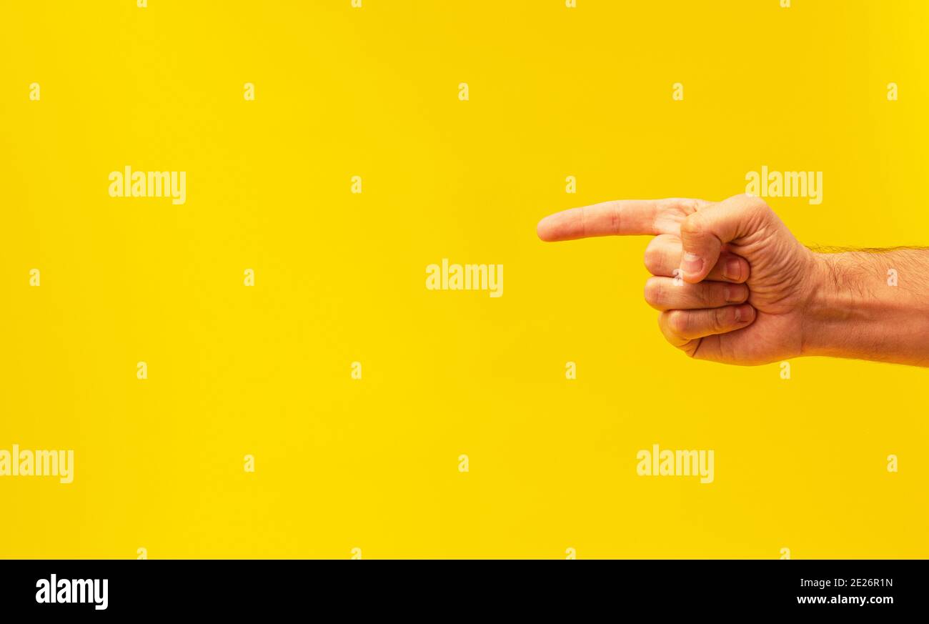 Finger pointing gesture indicating hi-res stock photography and images ...
