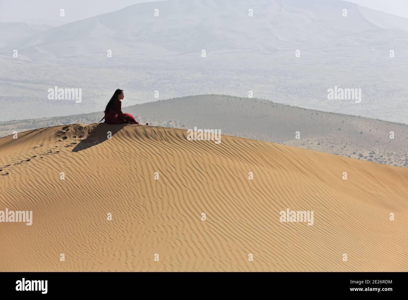 Maroon gown hi-res stock photography and images - Alamy