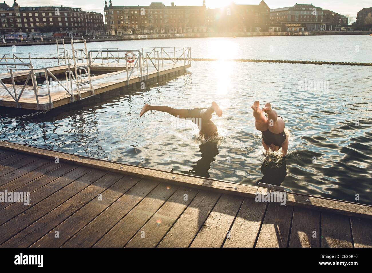 Two Friends Diving Into Freezing Water in Copenhagen, Denmark Stock ...