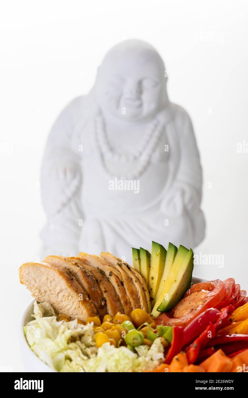 buddha bowl with chicken on white Stock Photo - Alamy