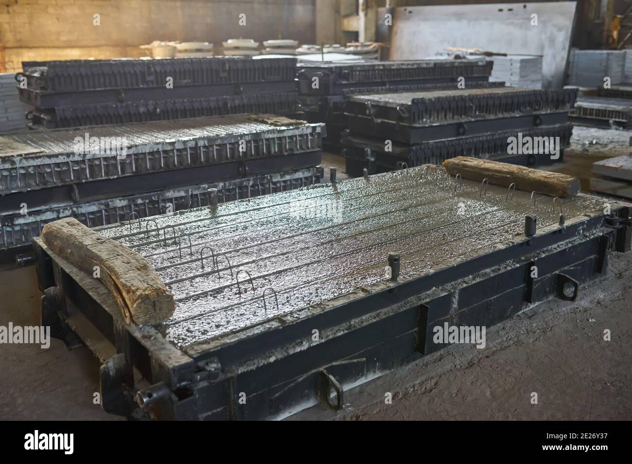 Manufacturing concrete slabs. reinforced concrete production. Workers ...