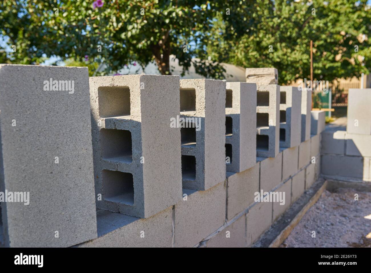 Stack of cement blocks at the construction site. cinder blocks ...