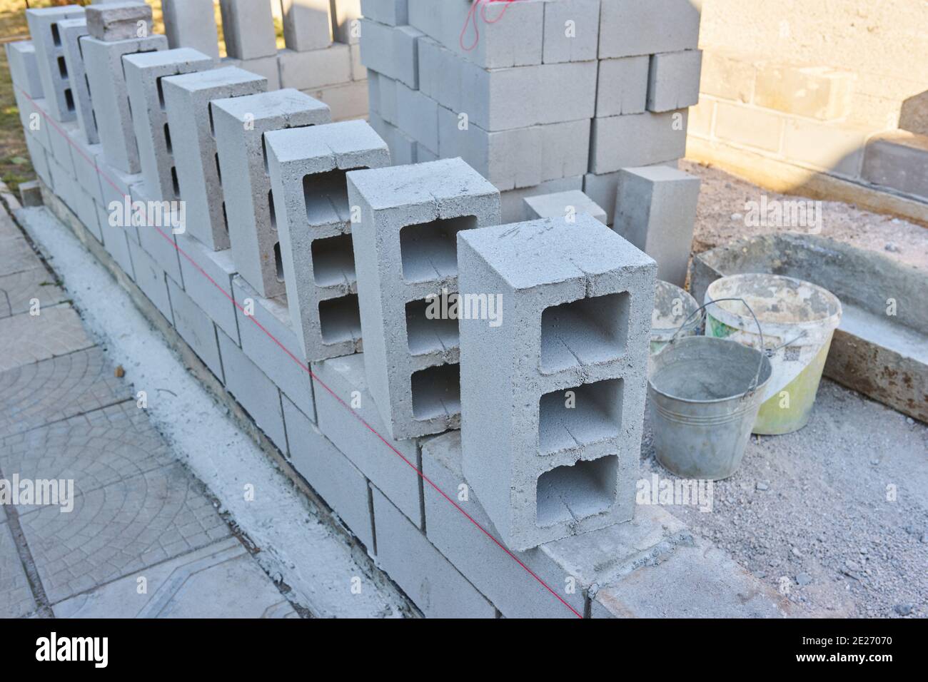 Stack of cement blocks at the construction site. cinder blocks ...