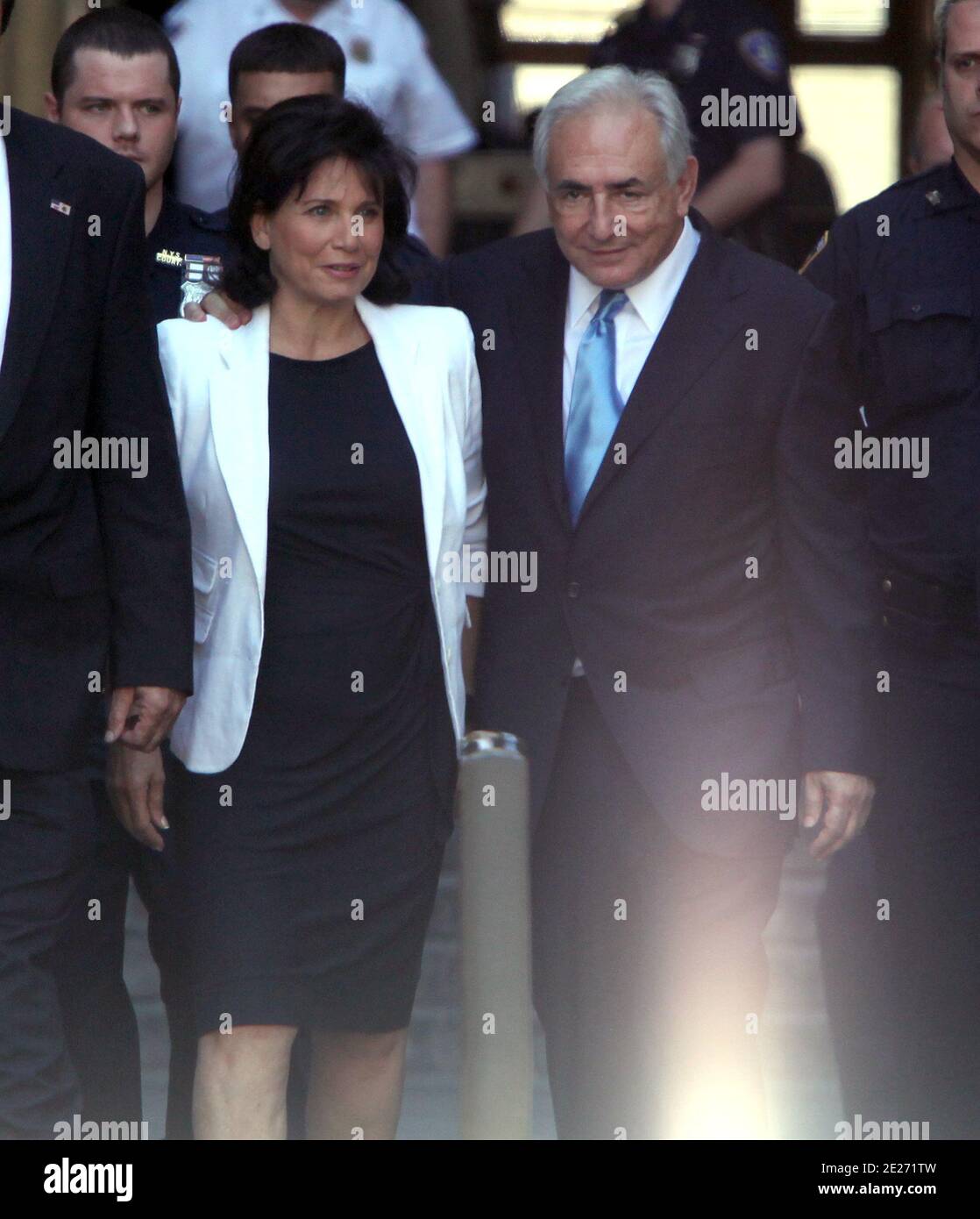 Dominique Strauss-Kahn and his wife Anne Sinclair leave The Court in ...