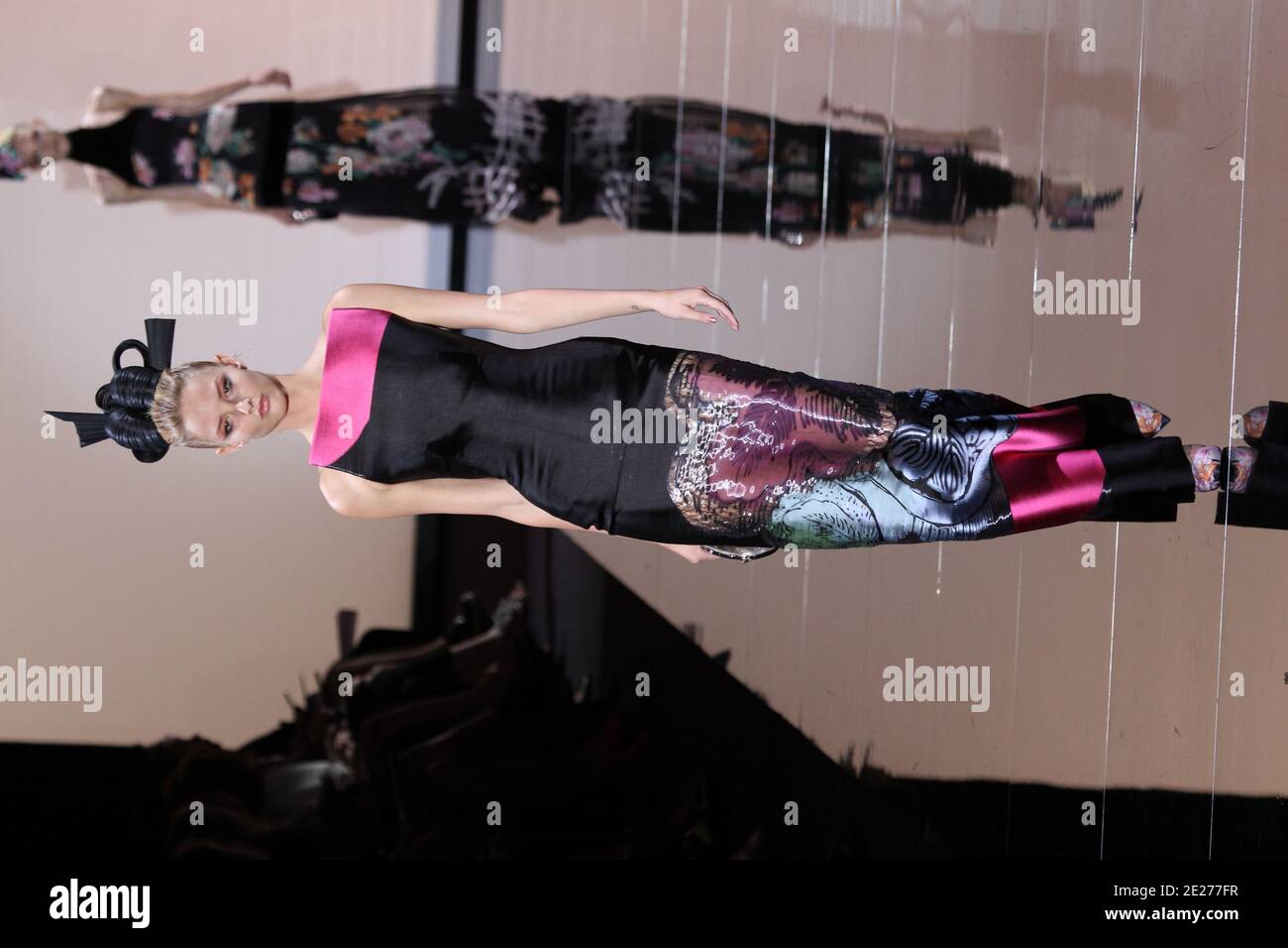 Models display creations by Giorgio Armani for his Armani Prive Fall ...