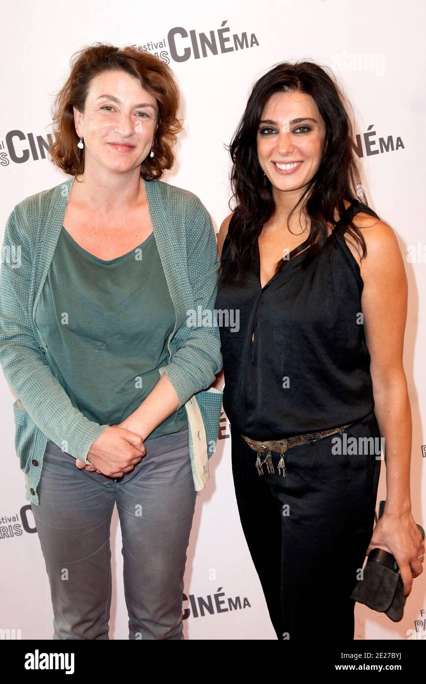 Lebanese director Nadine Labaki (R) poses with French actress Noemie ...