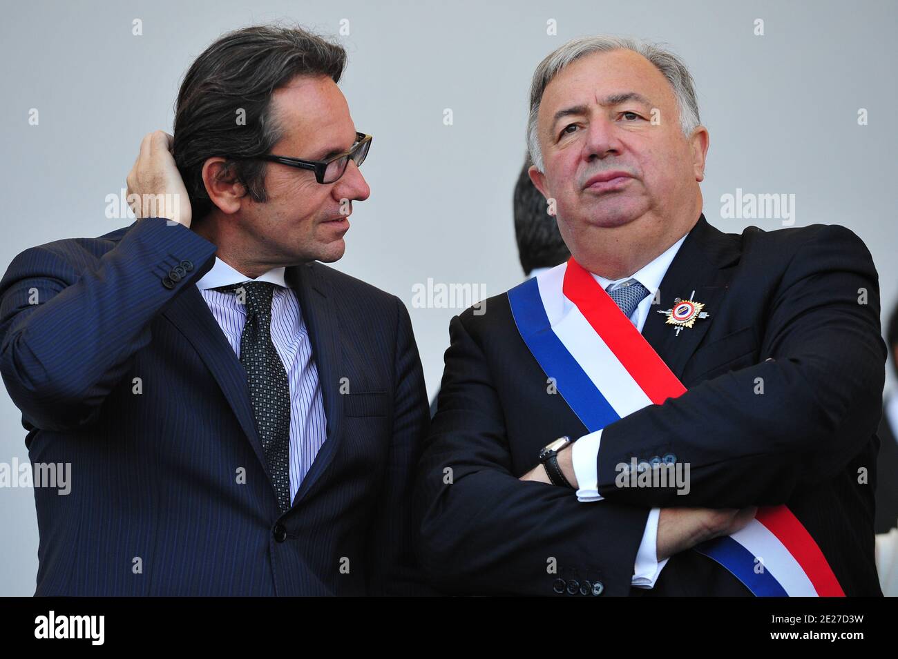 Frederic Lefebvre and Gerard Larcher attend the Bastille day parade on ...