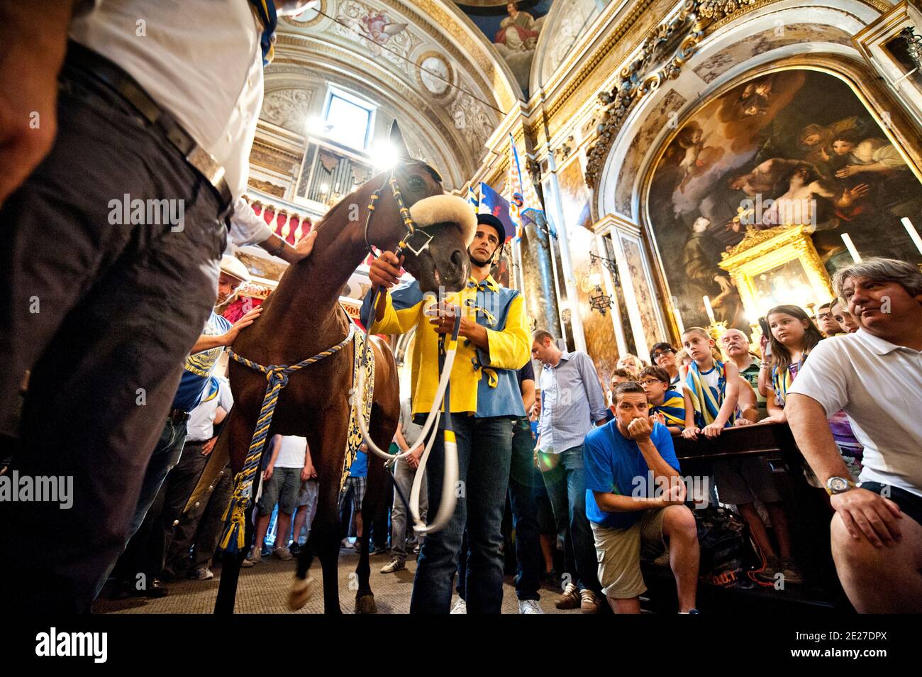 Horse blessing ceremony in the church before the race, Siena Palio ...