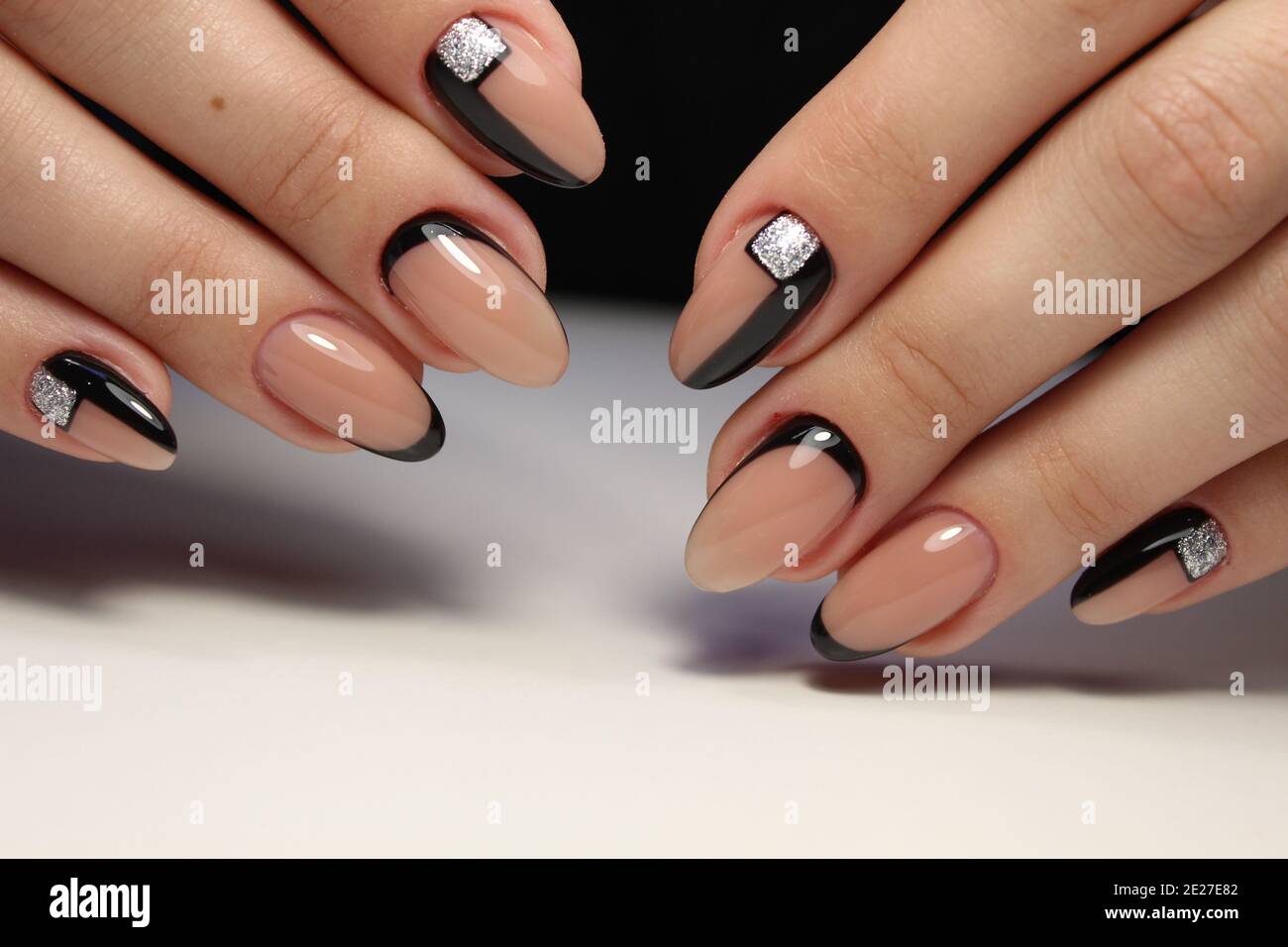glamorous beautiful manicure on a trendy texture background Stock Photo ...