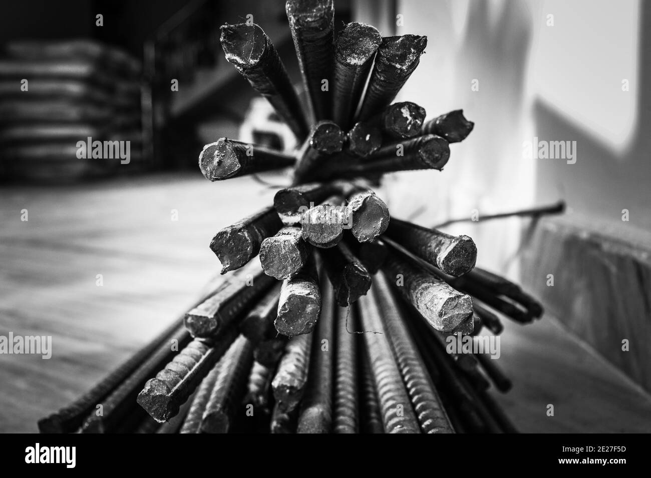 Pile of steel round rods storage and stacking in a warehouse for an ...