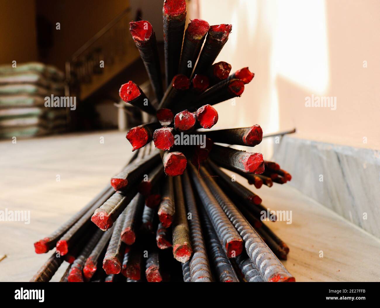 Pile of steel round rods storage and stacking in a warehouse for an ...