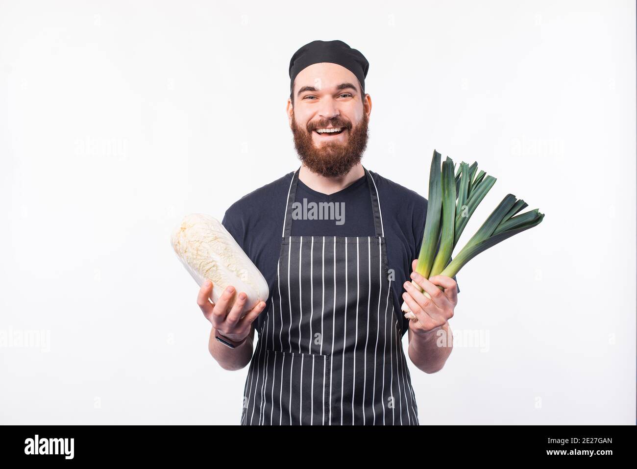Man holding leek hi-res stock photography and images - Alamy