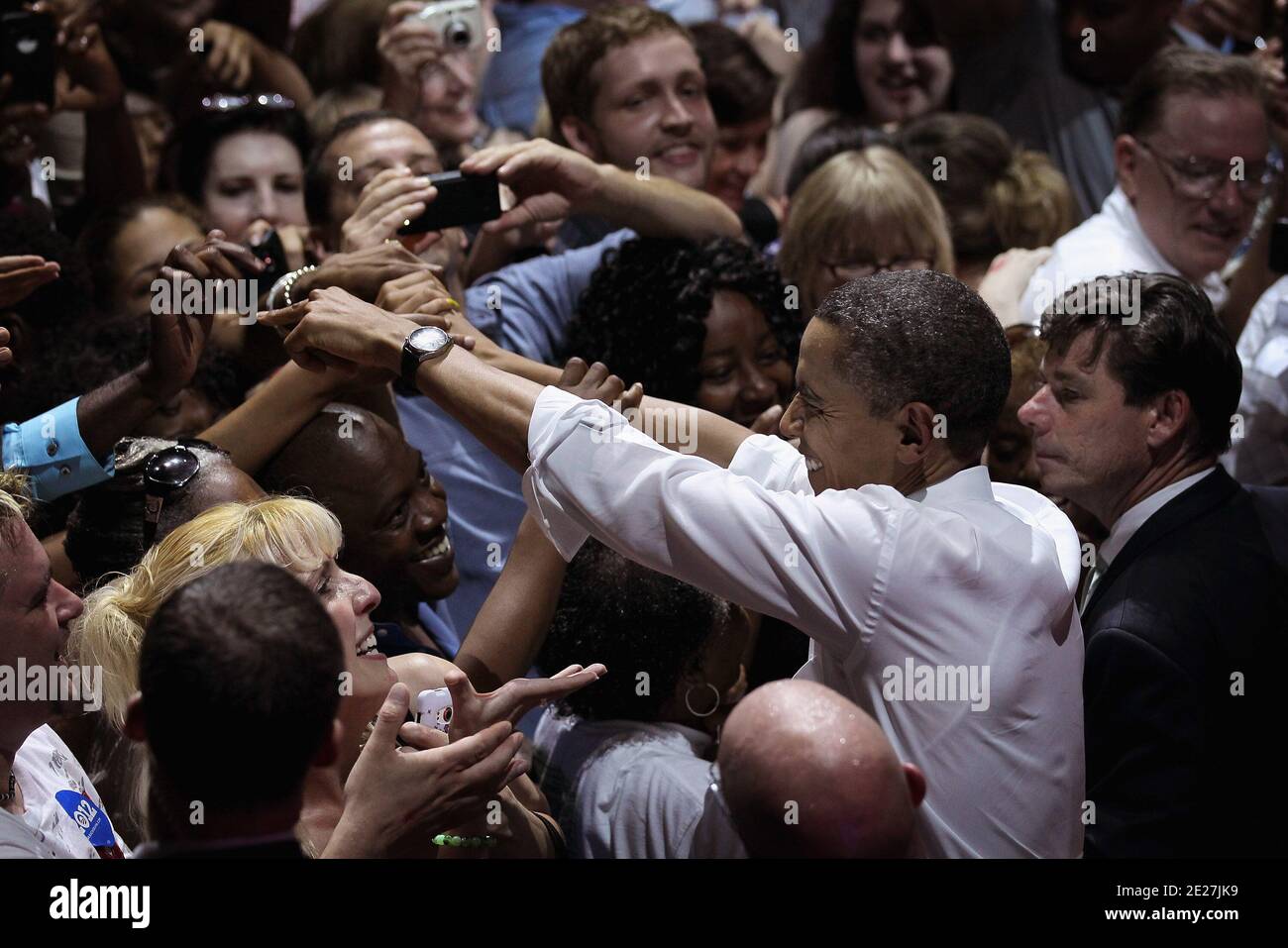 U.S. President Barack Obama greets supporters during a fundraiser at ...