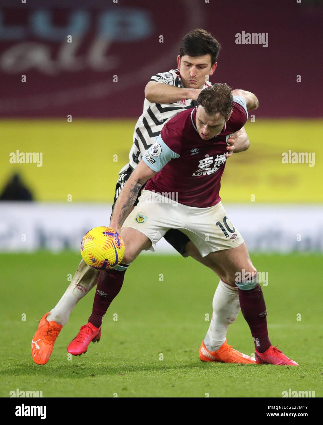 Burnley's Ashley Barnes and Manchester United's Harry Maguire battle ...