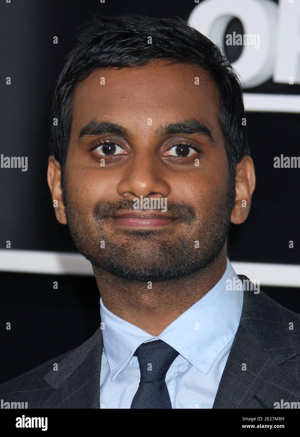 Aziz Ansari arriving for the Minutes Or Less' film premiere at Graumans ...