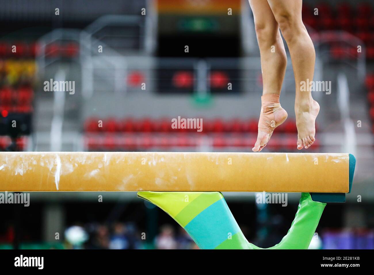 Balance beam artistic gymnastics competition performance. Close up ...