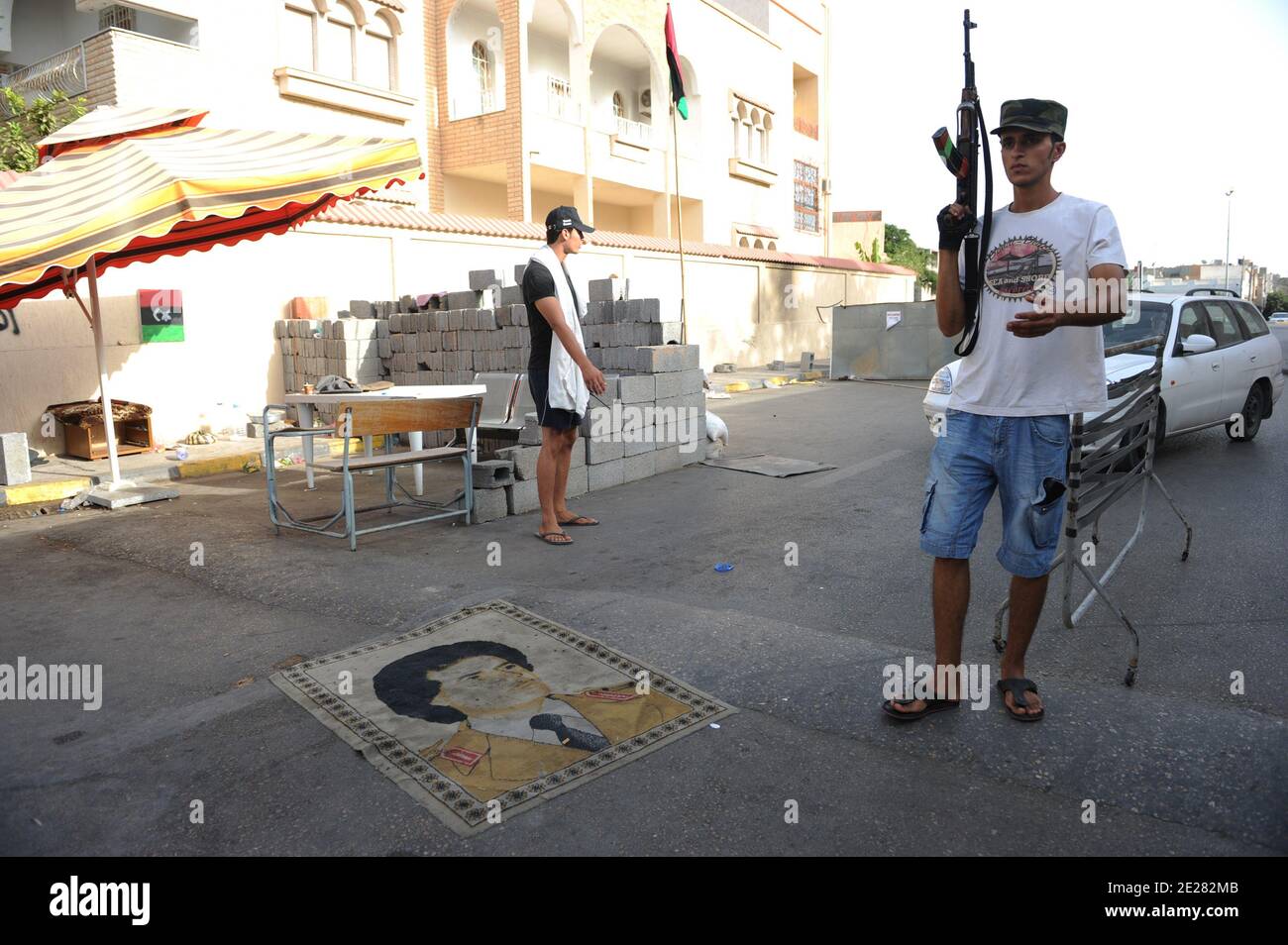 Libyan rebel seen controlling the streets of Tripoli, Libya, on ...