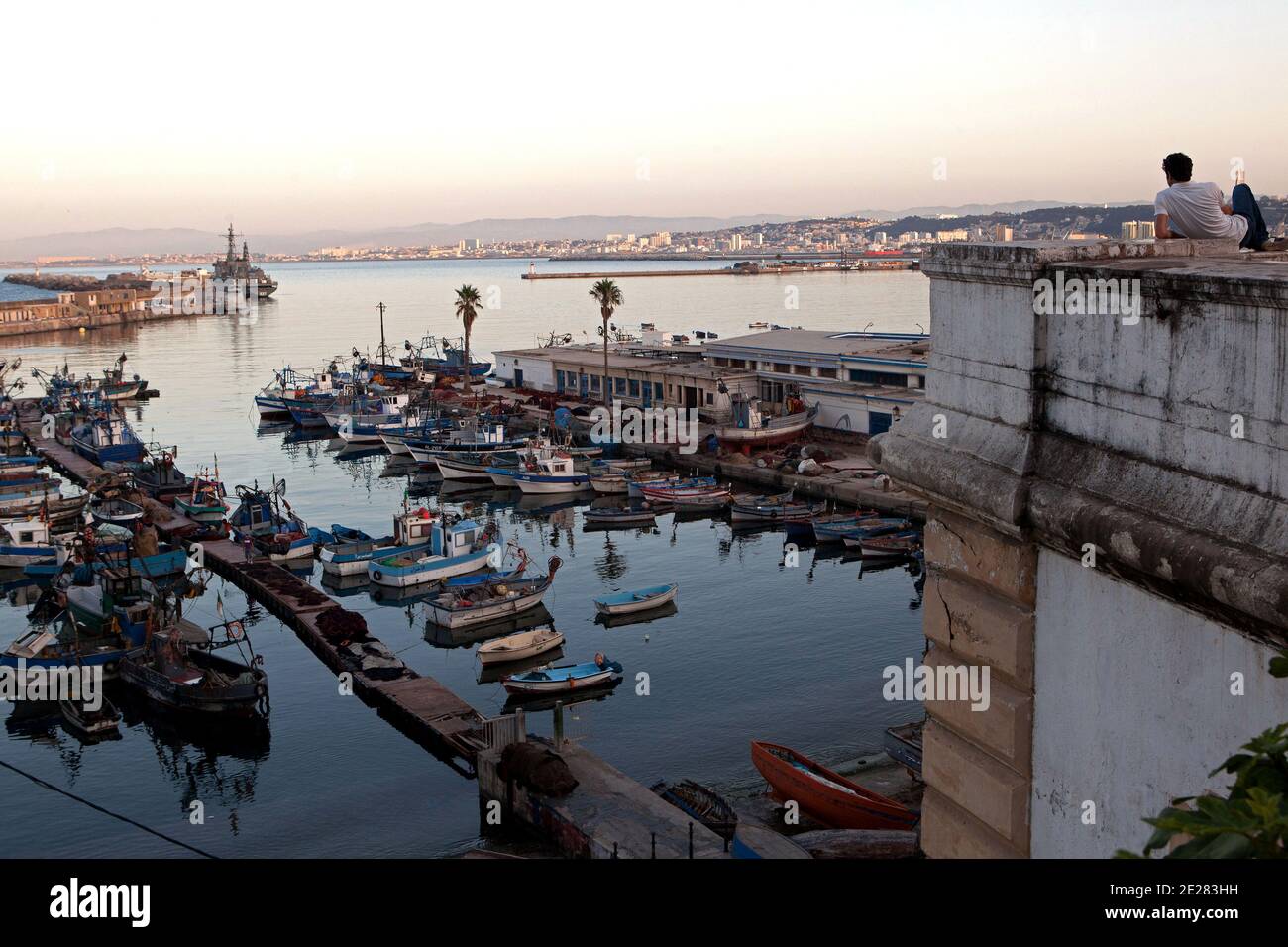 Illustration of the port of Alger, a man looks the sea, Algeria, on ...