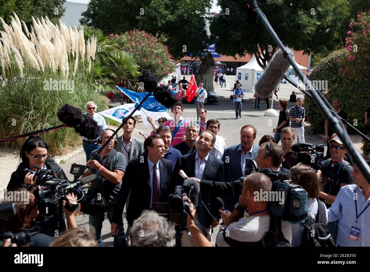 UMP right wing party general secretary Jean-Francois Cope flanked by ...