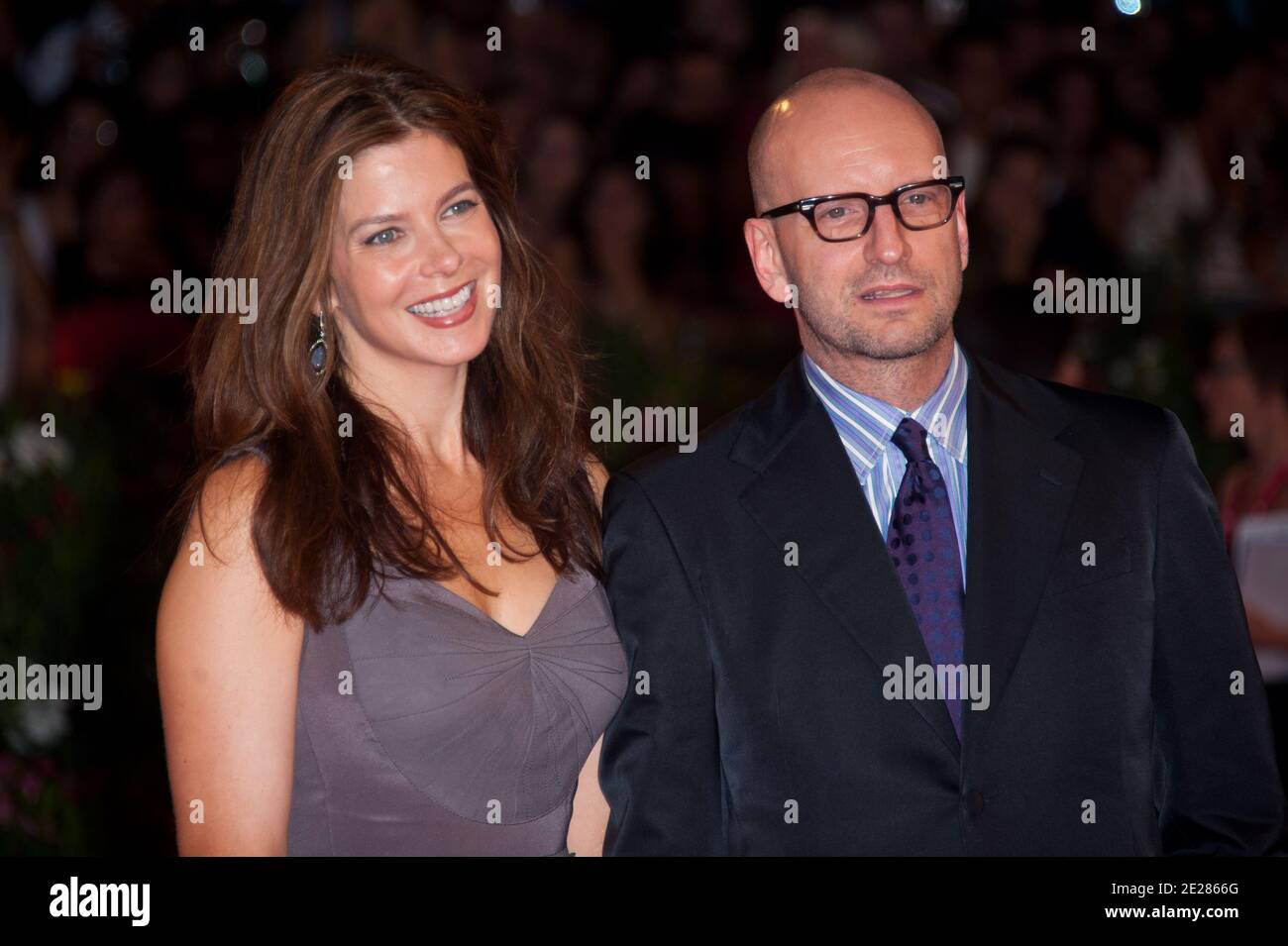 US director Steven Soderbergh (R) and his wife Jules Asner arriving on ...