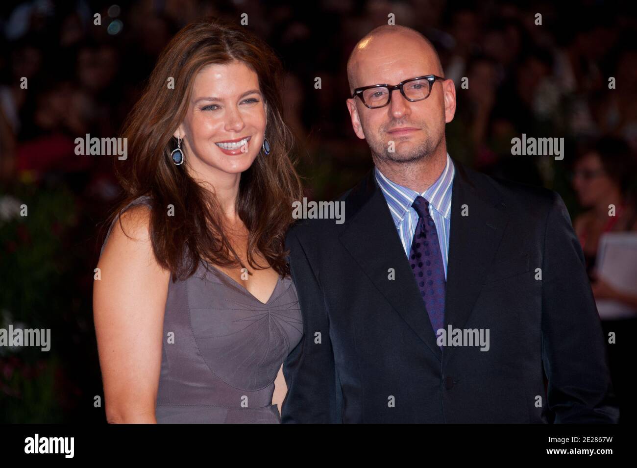 US director Steven Soderbergh (R) and his wife Jules Asner arriving on ...