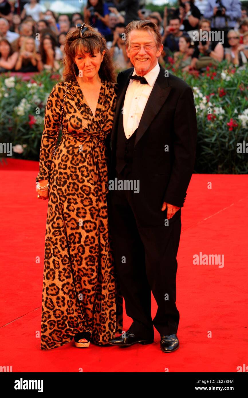 Anwen Rees Meyers and John Hurt arriving at the 'Tinker, Tailor ...