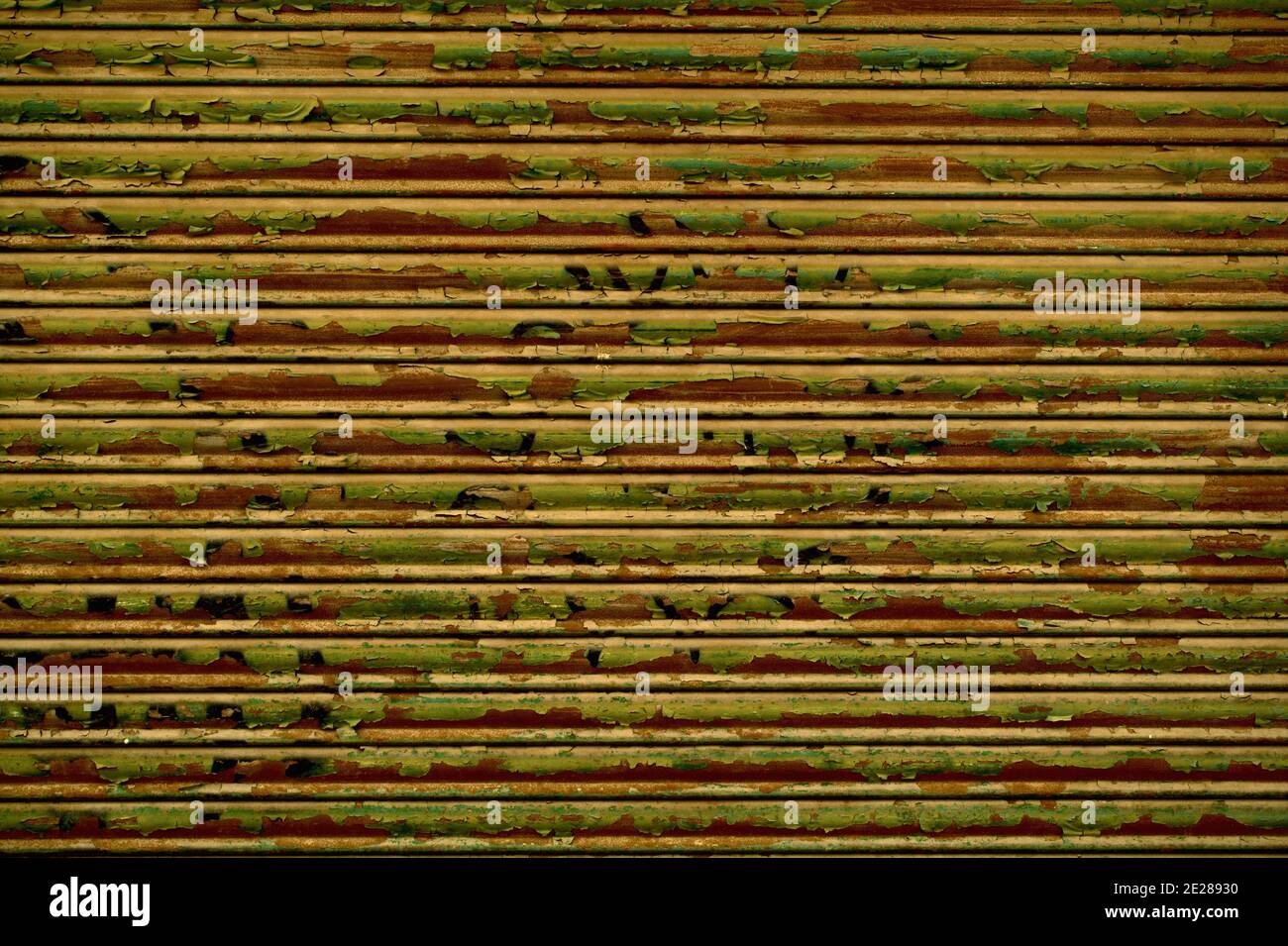 Flaking peeling green paint on rusty metal panel Stock Photo - Alamy