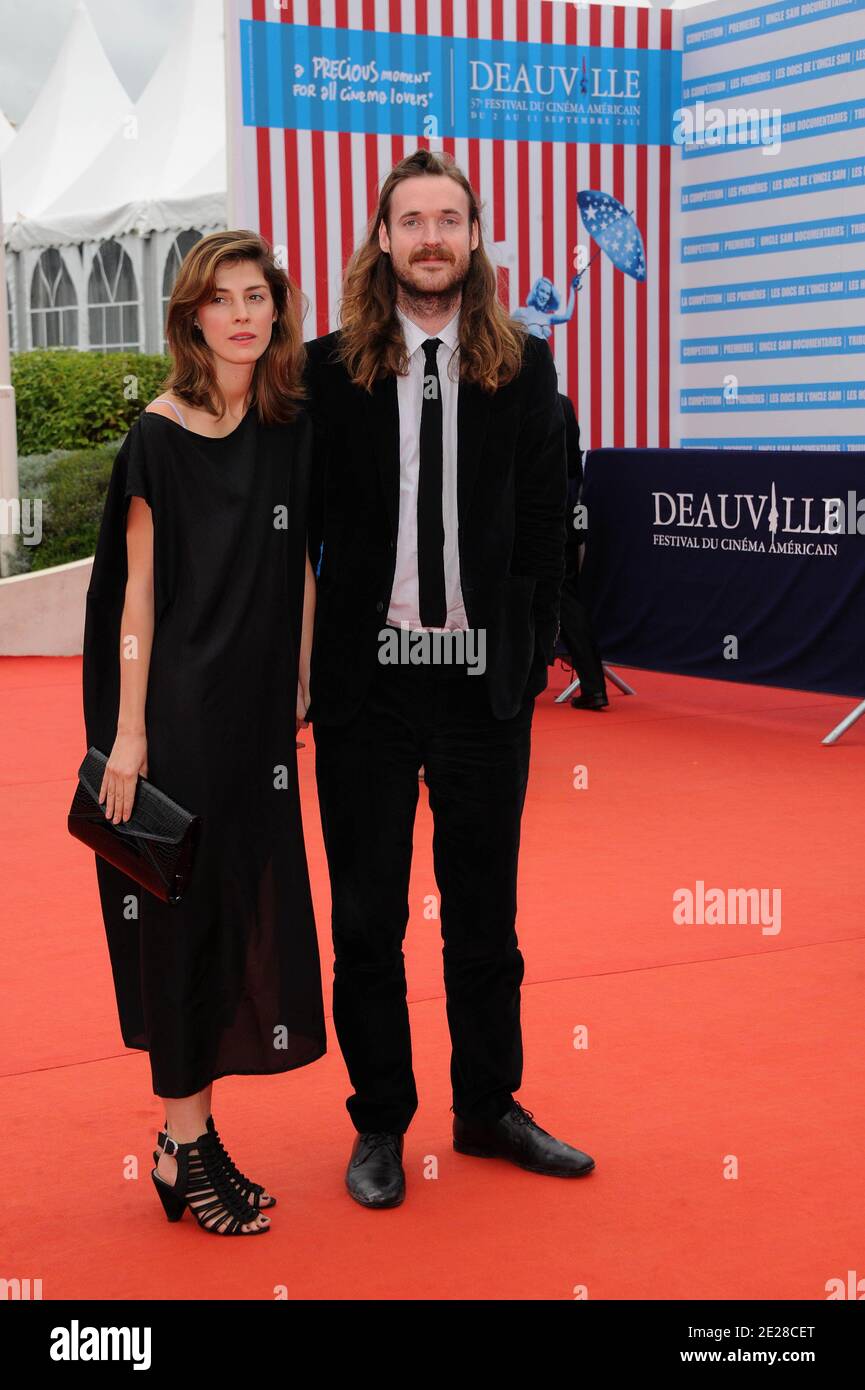 Mike Cahill and his wife arrive at the screening of 'Another Earth ...