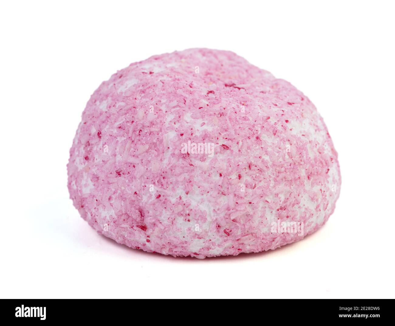 Pink coconut ball candy on white background Stock Photo - Alamy