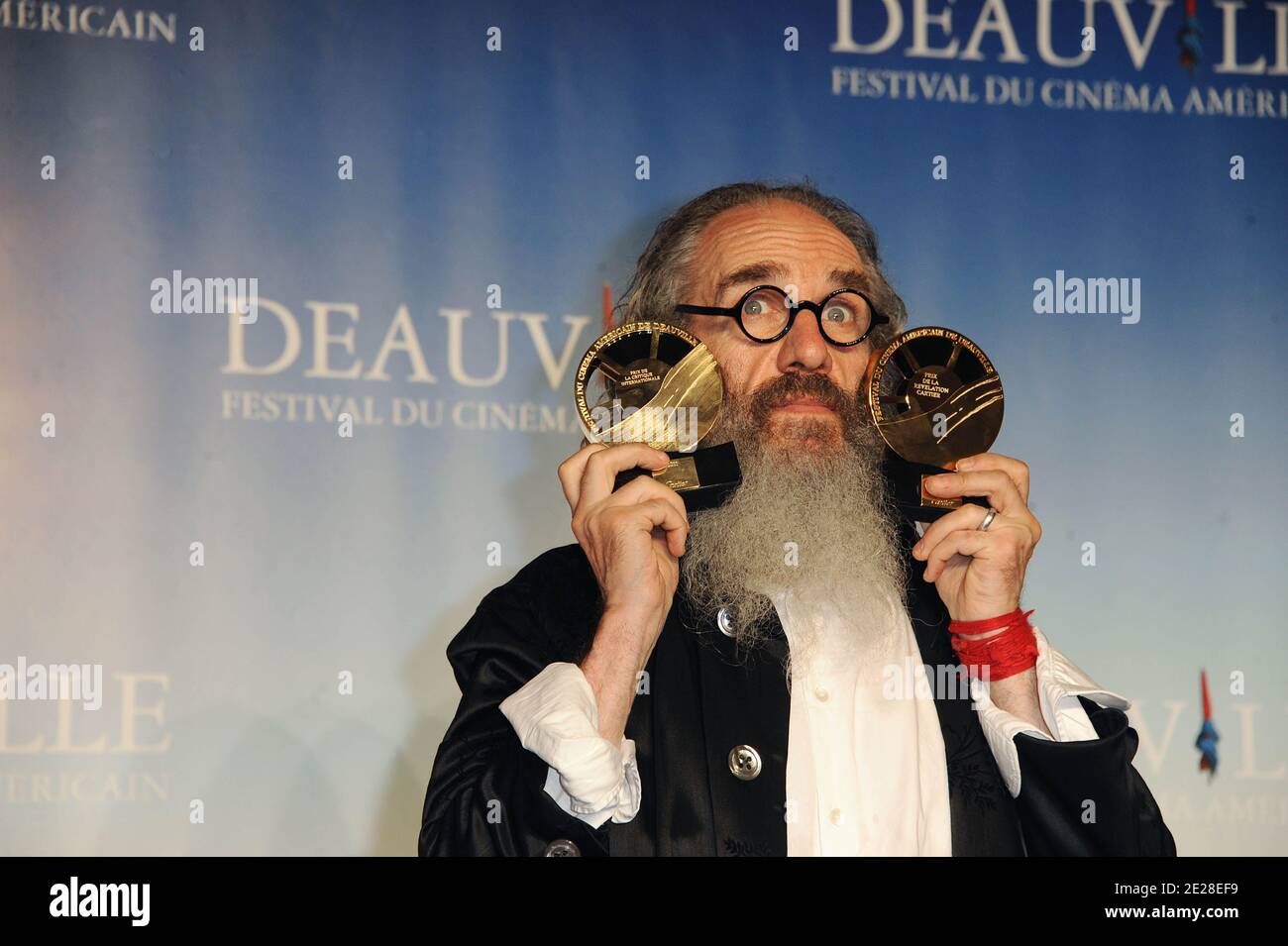 Director Tony Kaye poses after winning the revelation prize and the ...