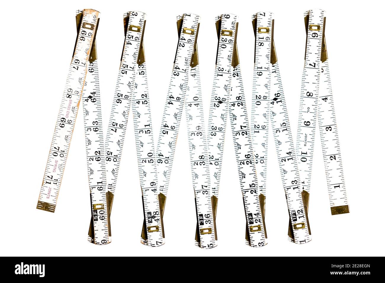 Antique folding ruler on a white background Stock Photo - Alamy