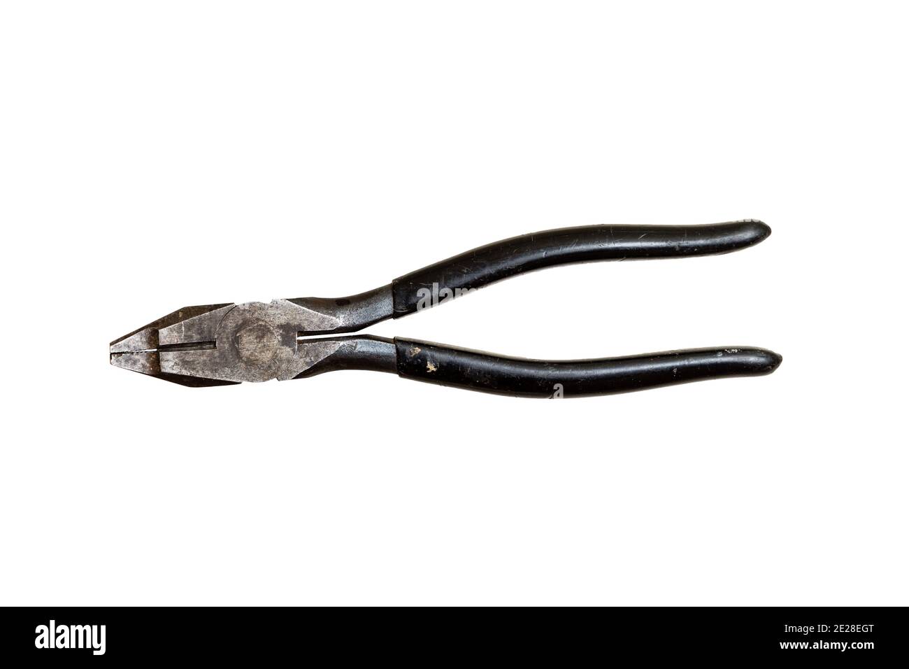 Antique lineman pliers on a white background Stock Photo - Alamy