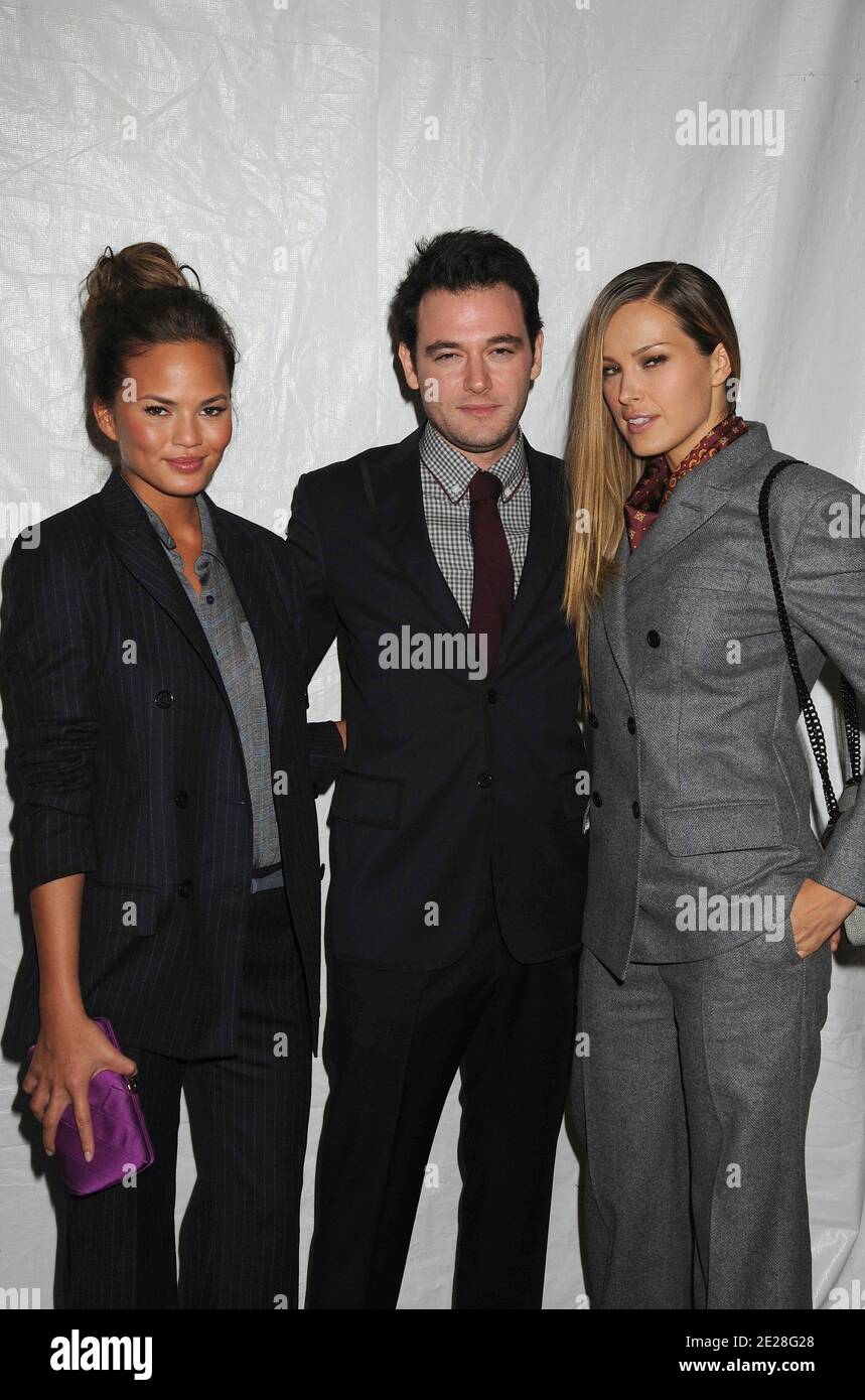 L-R: Christine Teigen, Jamie Belman and Petra Nemcova at the backstage ...