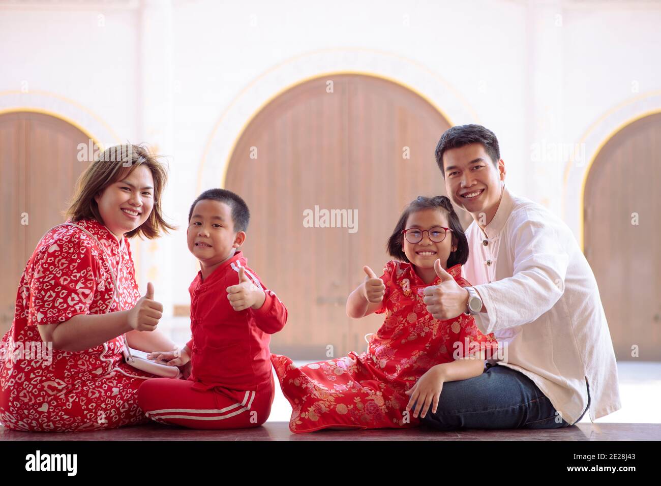 asian family wearing red chinese suit hand sign okay against chinese ...