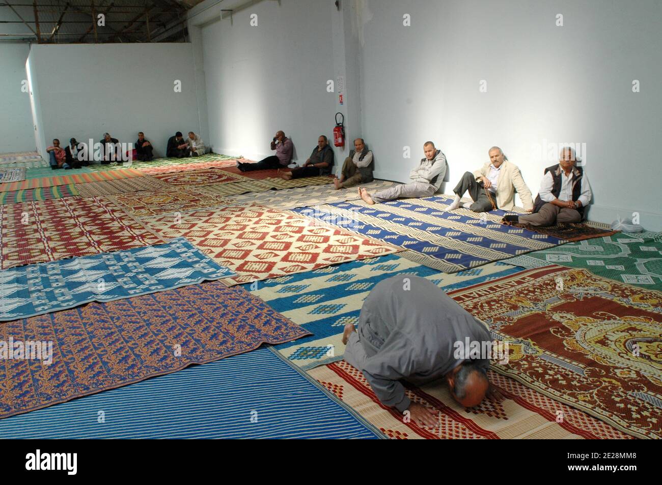 Muslim prayer on the streets of paris hi-res stock photography and ...