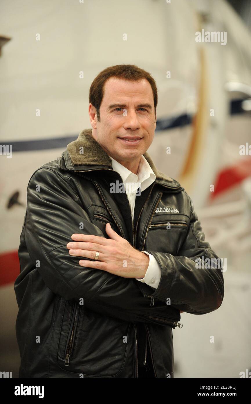 John Travolta unveils the new line of Bombardier's business aircraft at ...