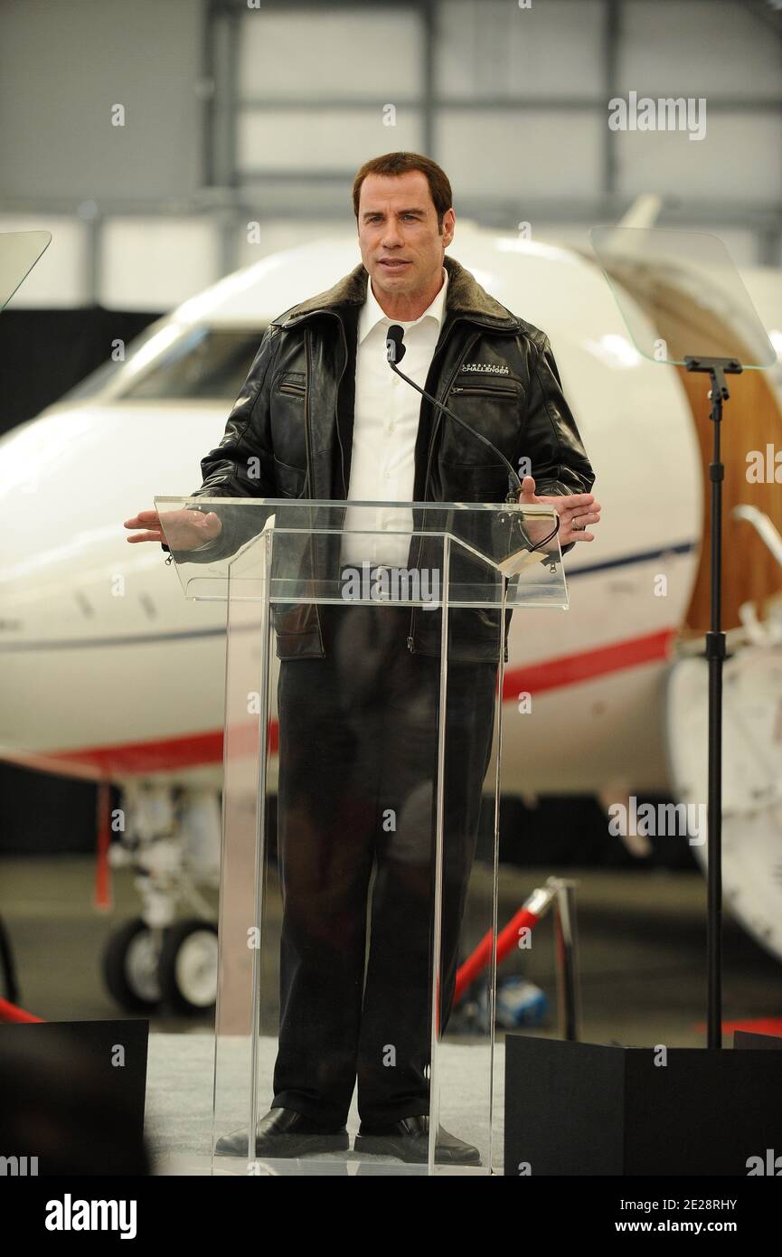 John Travolta unveils the new line of Bombardier's business aircraft at ...
