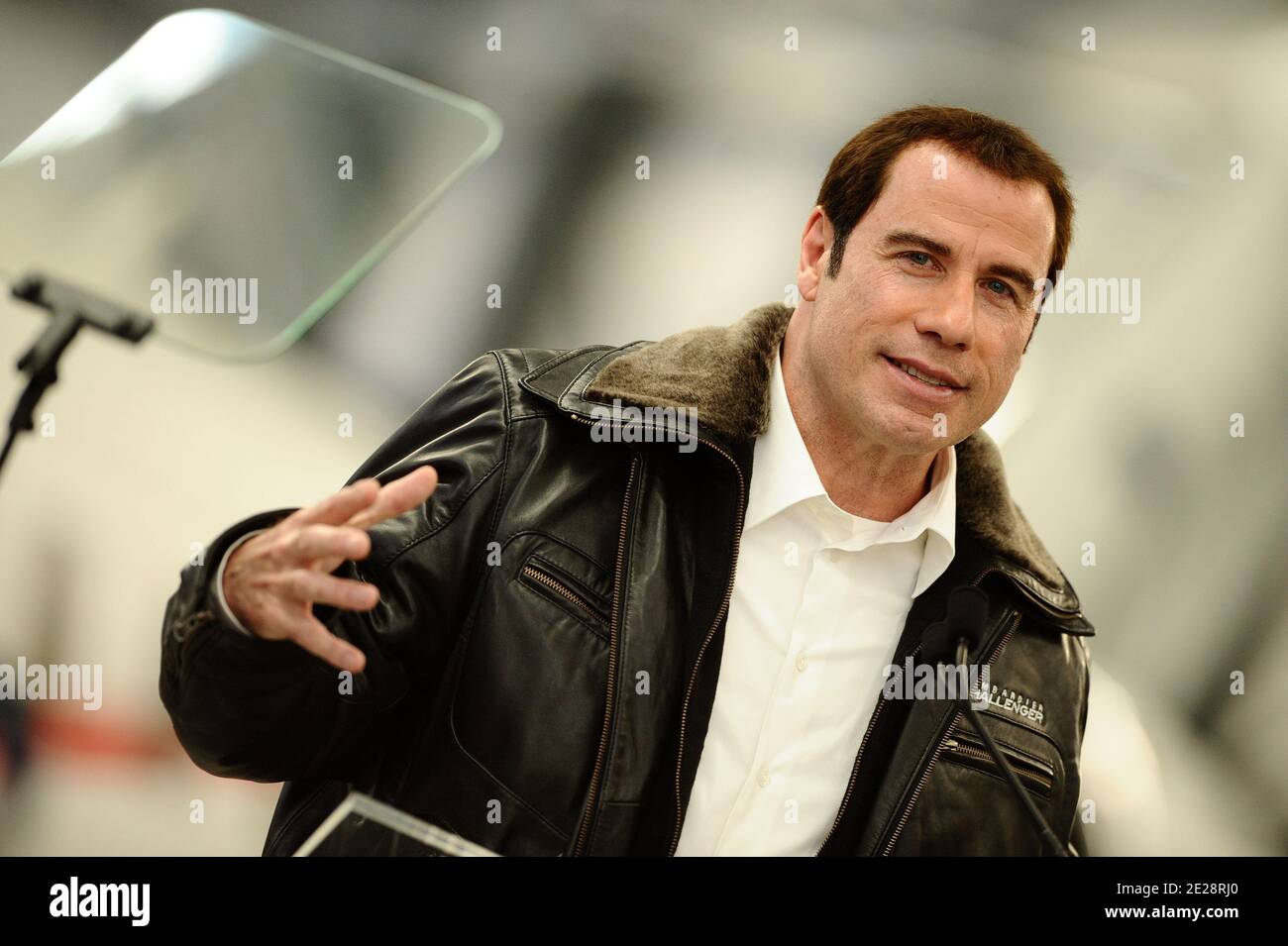 John Travolta unveils the new line of Bombardier's business aircraft at ...
