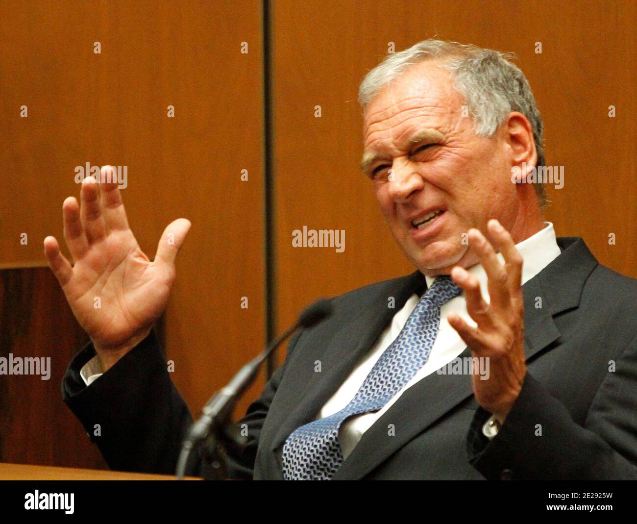 Paul Gongaware, Co-CEO of AEG Live and Concerts West gestures while on ...