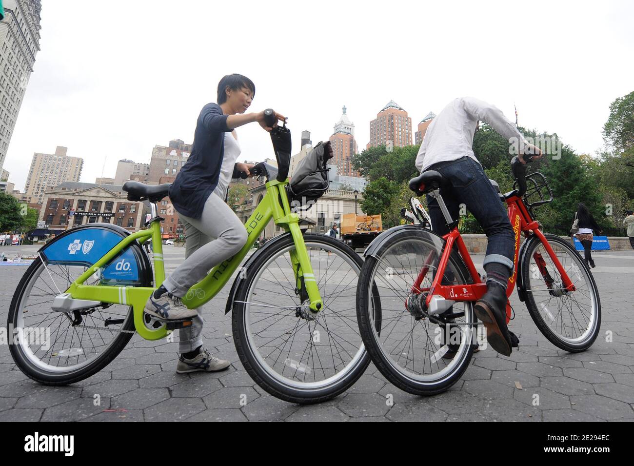 People test out the Alta Bicycle Share during a demonstration of the ...