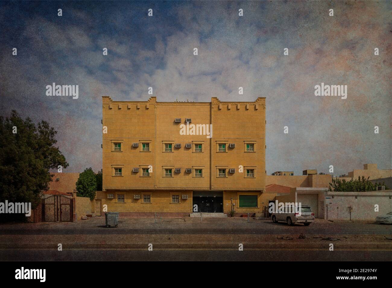 Apartment block - textured Stock Photo - Alamy