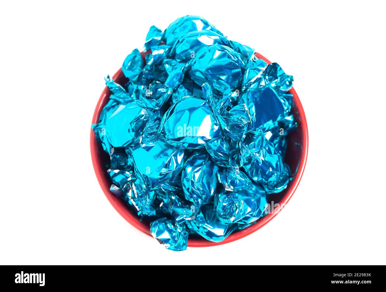 A Bowl of Blue Wrapped Candy Isolated on a White Background Stock Photo ...