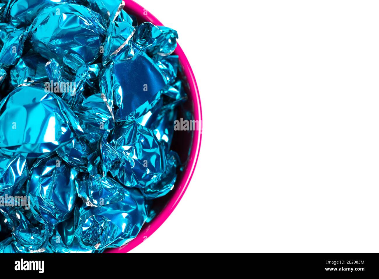 A Bowl of Blue Wrapped Candy Isolated on a White Background Stock Photo ...